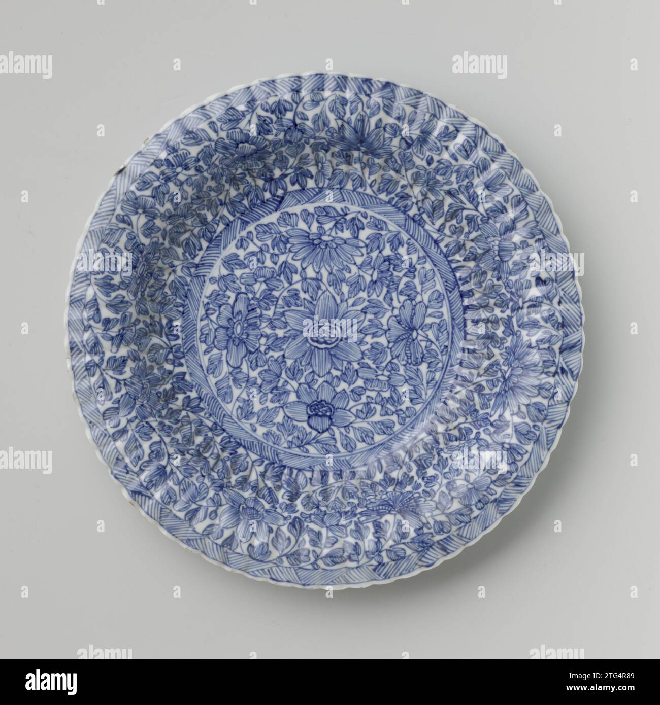 Plate with fluted sides and continuous flower pattern, anonymous, c ...