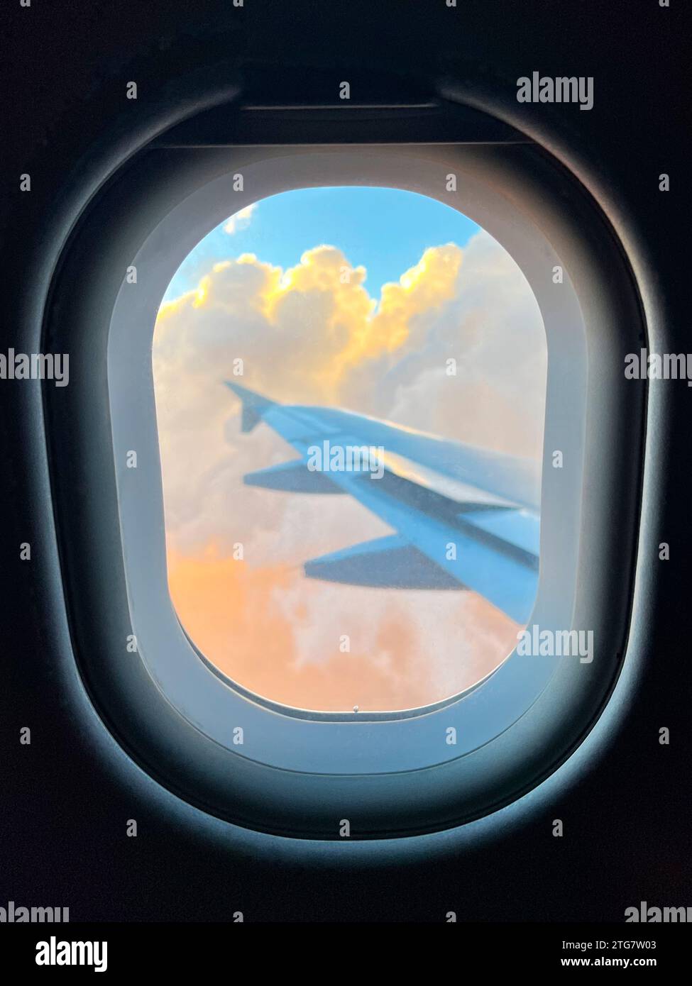 Wing through window view at sunset, flying into Phoenix, Arizona Stock ...