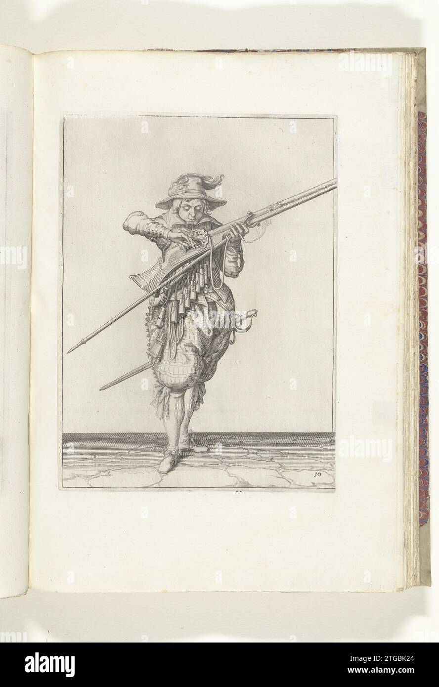 Soldier who blows his wick clean, covering the pan of his musket with ...