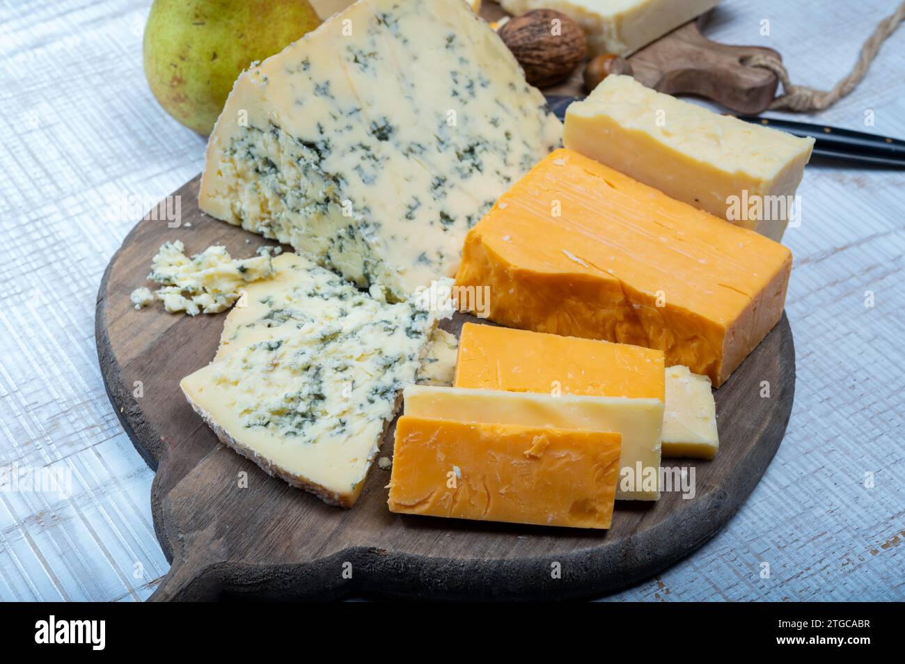 English cheeses collection, mature and coloured cheddar cheese and semi ...