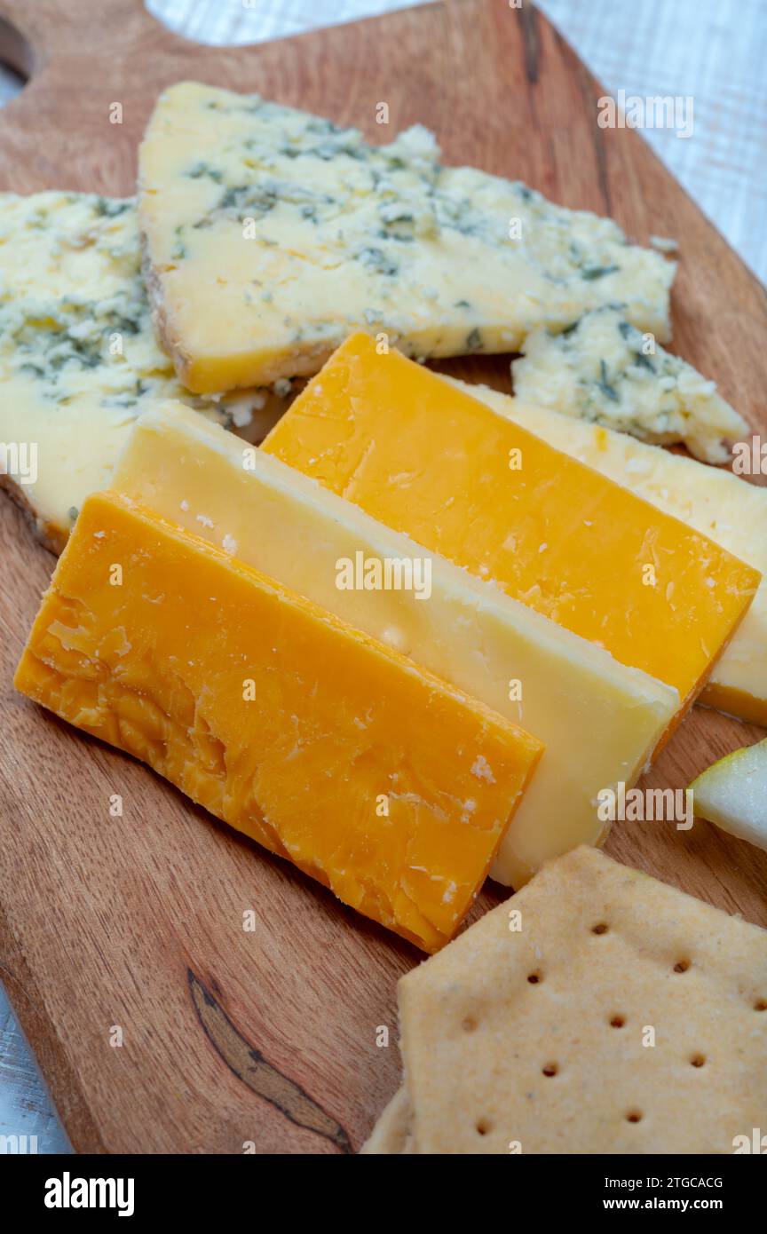 English cheeses collection, mature and coloured cheddar cheese and semi ...
