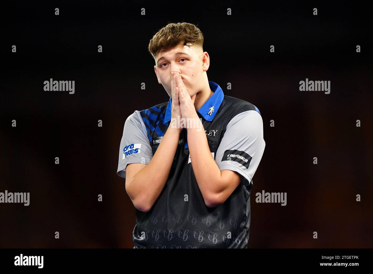Owen Bates reacts during his match against Steve Lennon (not pictured ...