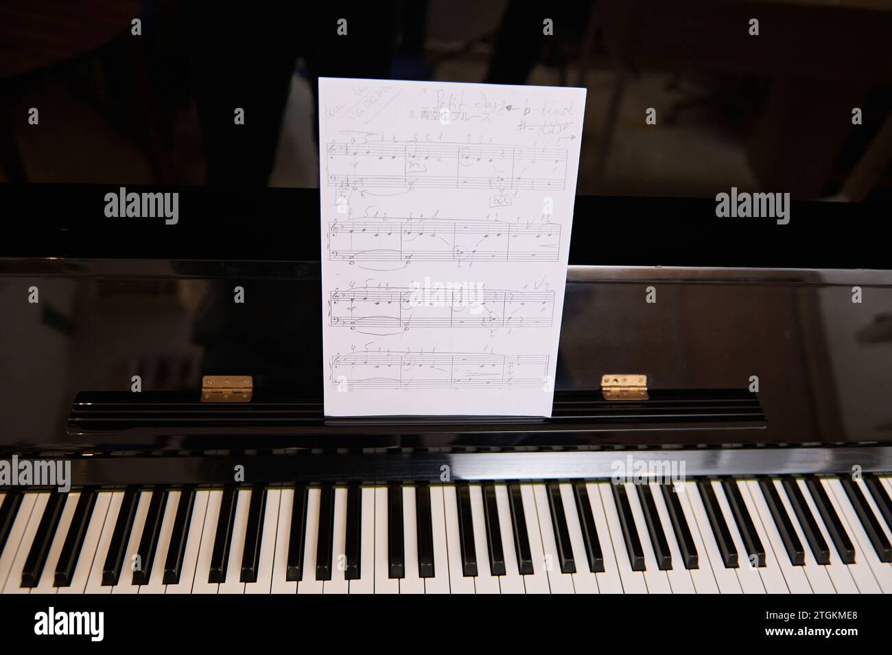 Still life of old vintage black piano with ebony and ivory keys and ...
