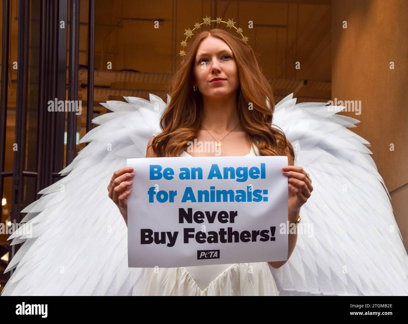 London, UK. 20th December 2023. A PETA activist dressed as an angel ...