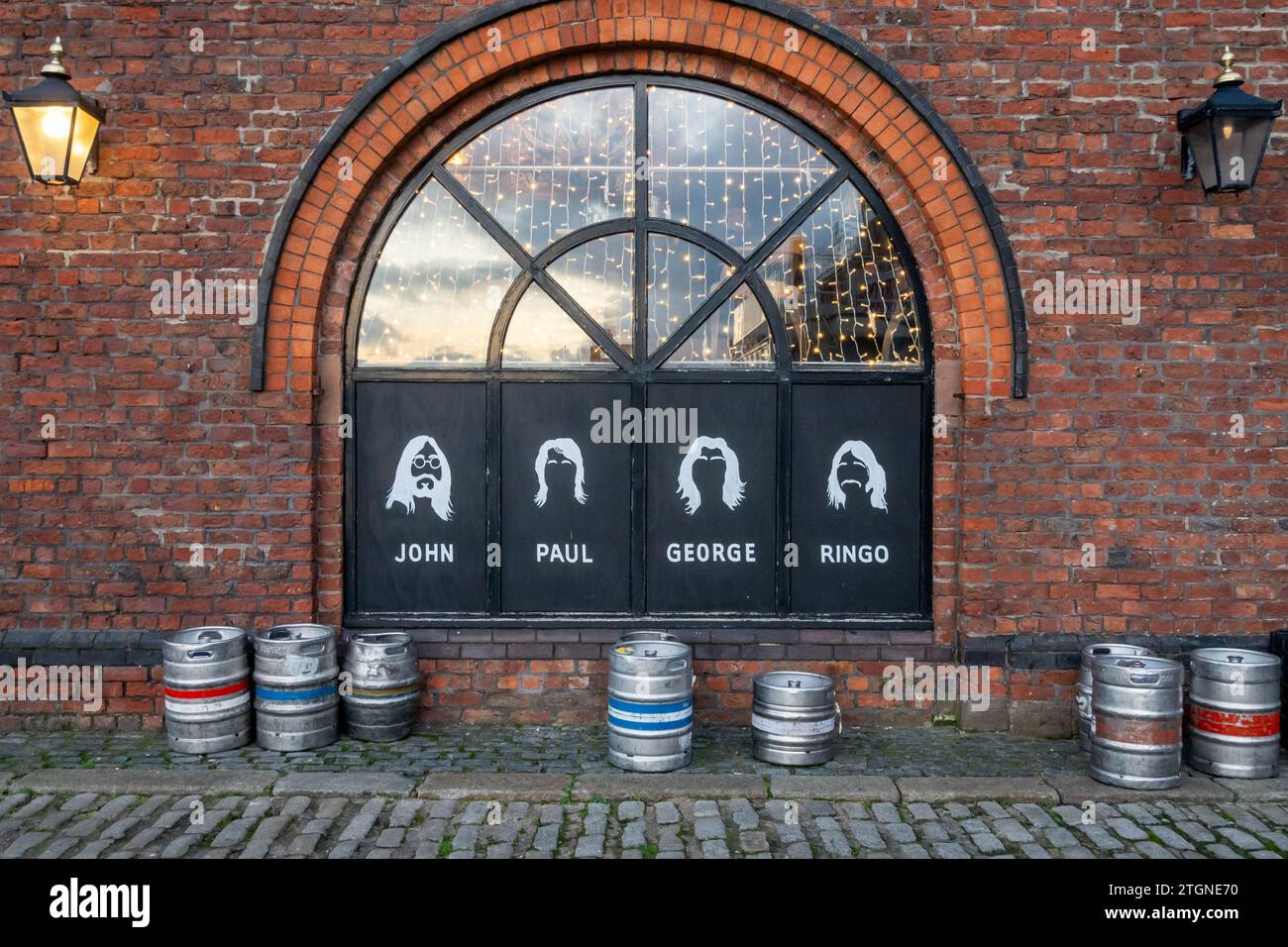 Pump House window with Beatles drawings in Liverpool Stock Photo - Alamy