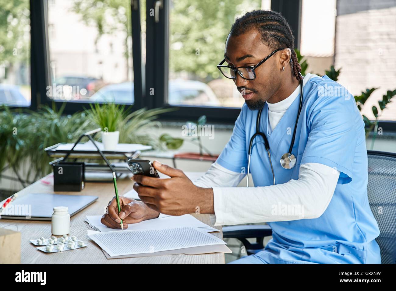 Doctor taking notes telehealth hi-res stock photography and images - Alamy