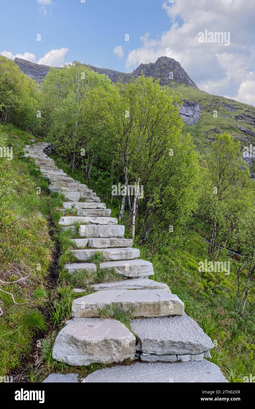 The Reinebringen trail in Lofoten, Norway, presents a stairway of ...