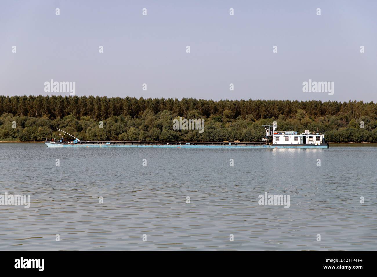 An inland river barge sailing down the Danube River Stock Photo - Alamy