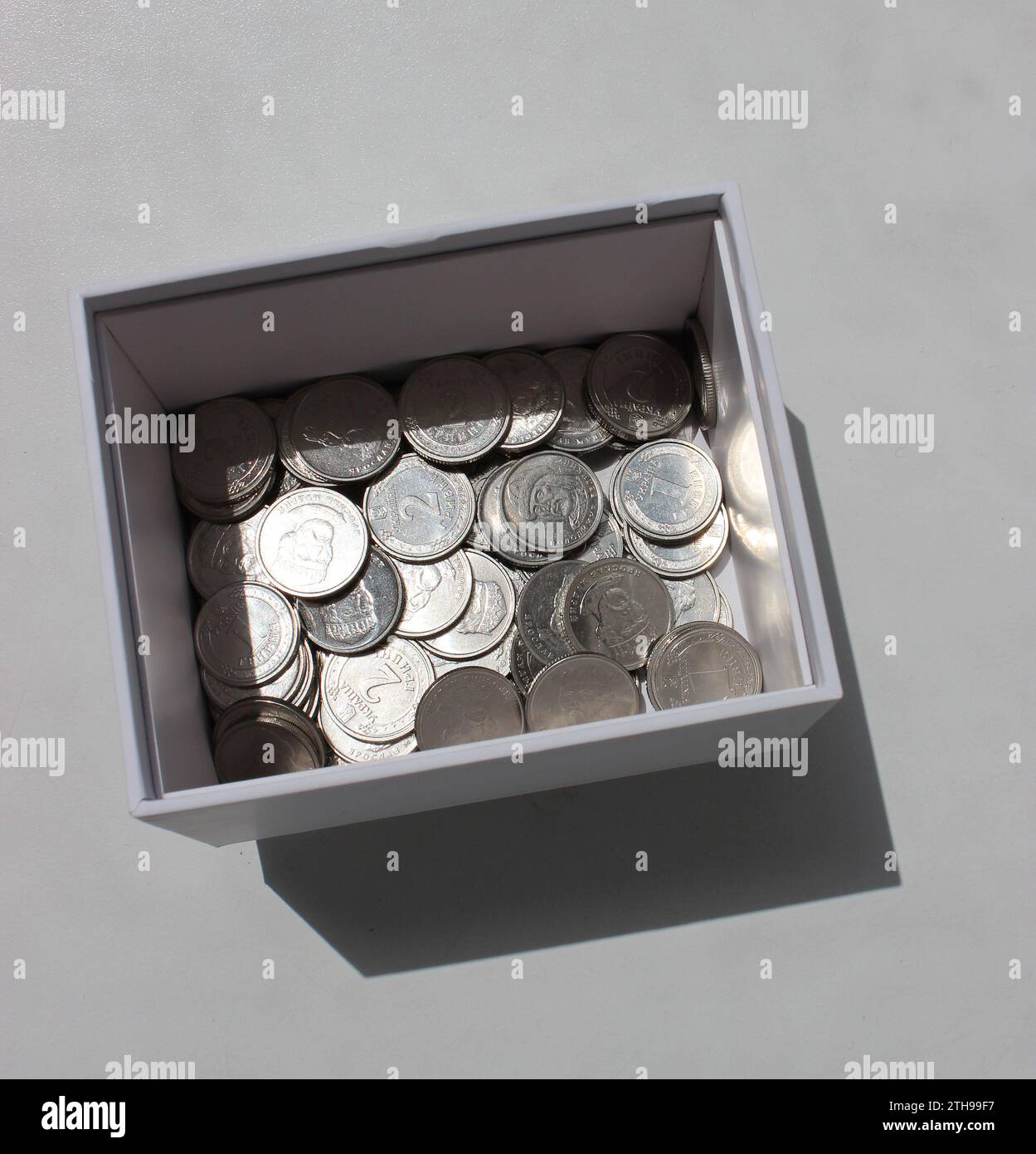 Square Photo Of Cardboard Money Box With Scattered Ukrainian Coins With ...