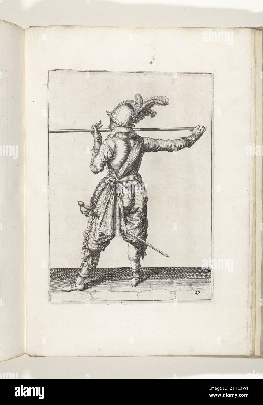 Soldier, seen on the back, who carries his skewers with both hands ...