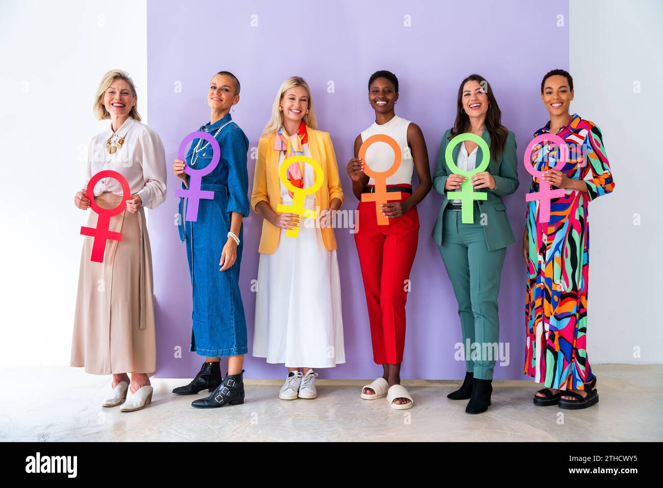 Group of beautiful confident women holding the femininity Venus symbol ...