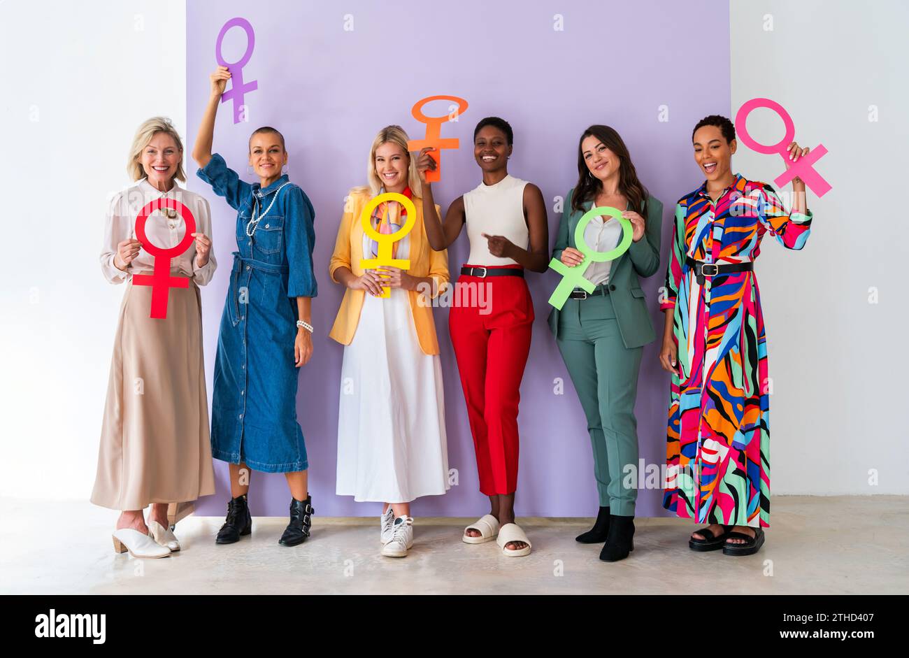 Group of beautiful confident women holding the femininity Venus symbol ...