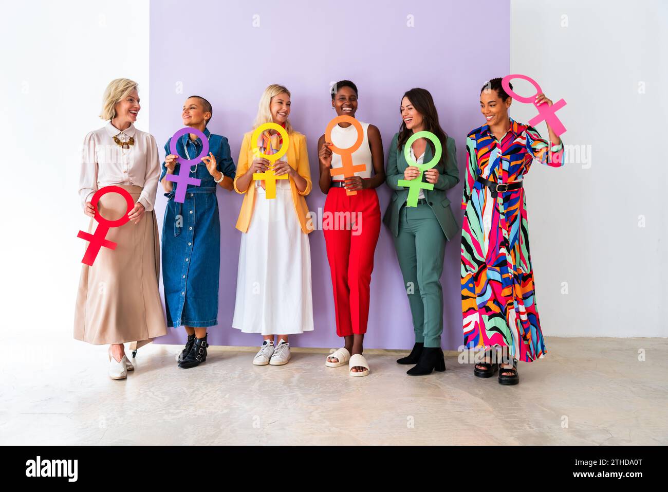 Group of beautiful confident women holding the femininity Venus symbol ...