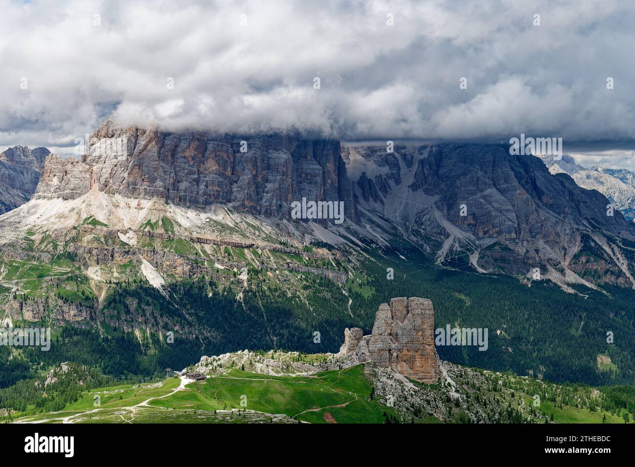 View of Cinque Torri with the Tofane mountain in the background covered ...