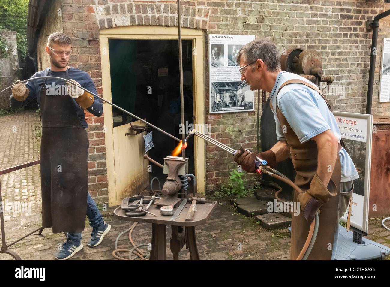 England, West Sussex, Arundel, Amberley Museum and Heritage Centre, Blacksmith at Work Welding ...