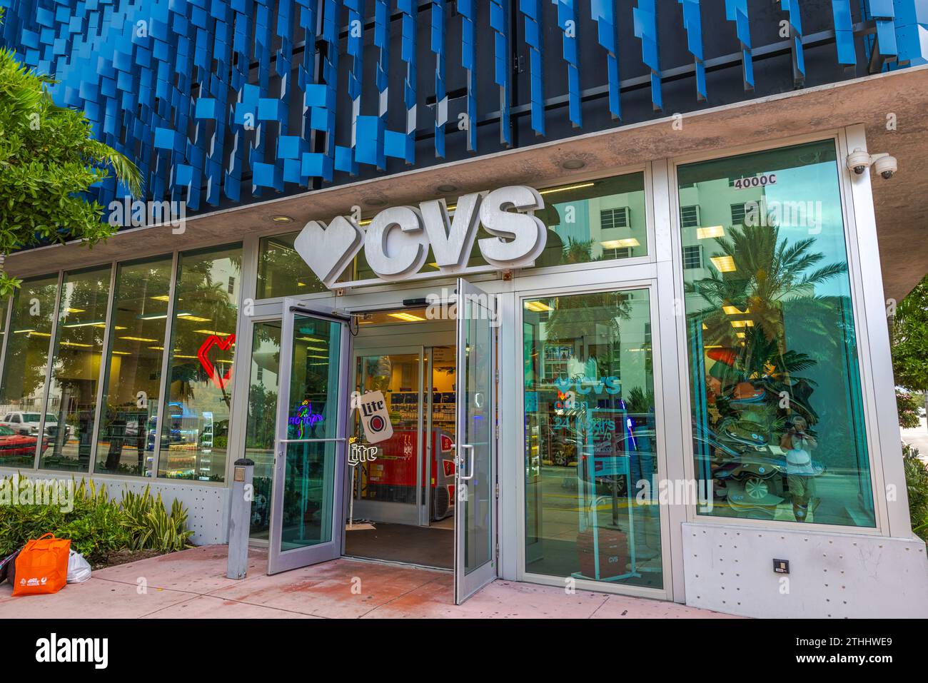 Beautiful colorful storefront of a CVS store with open doors for ...