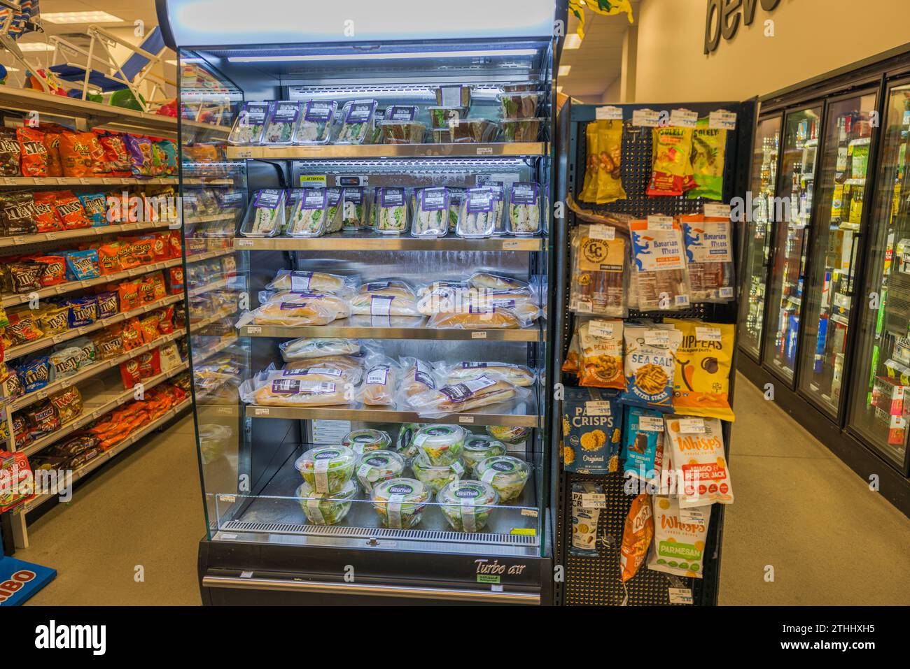 Close-up view of a refrigerated shelf for fresh salads and sandwiches ...