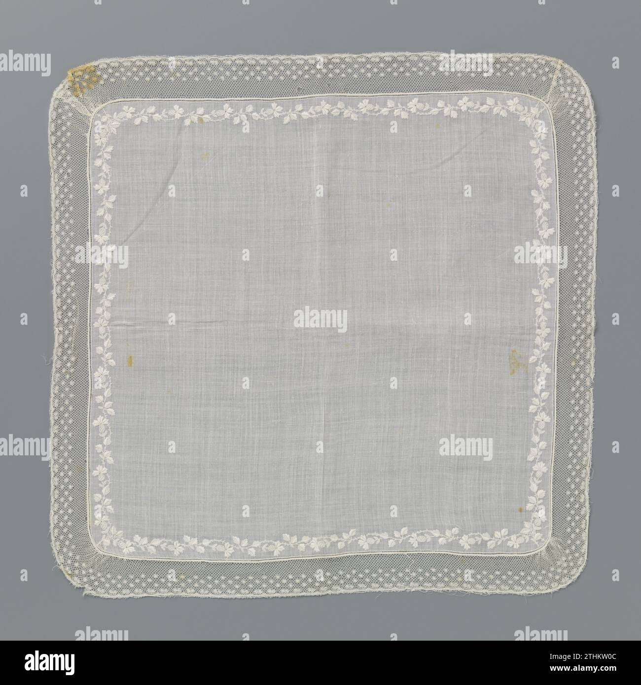 Batist handkerchief with thin wavy branch of plumetis embroidery and a ...
