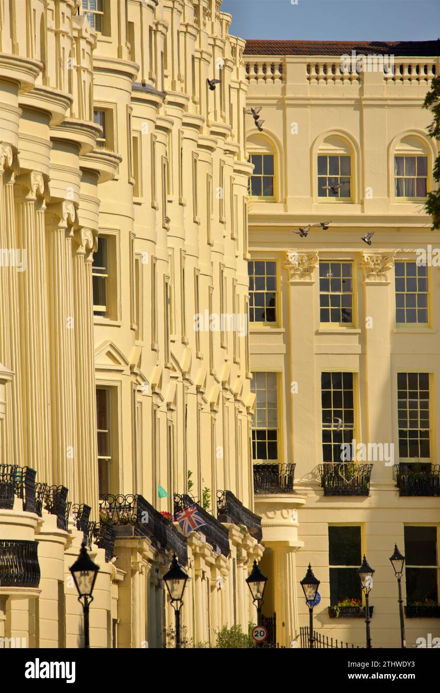 Sunlight on the stucco facades of Brunswick Square, Hove East Sussex England Facades of the ...