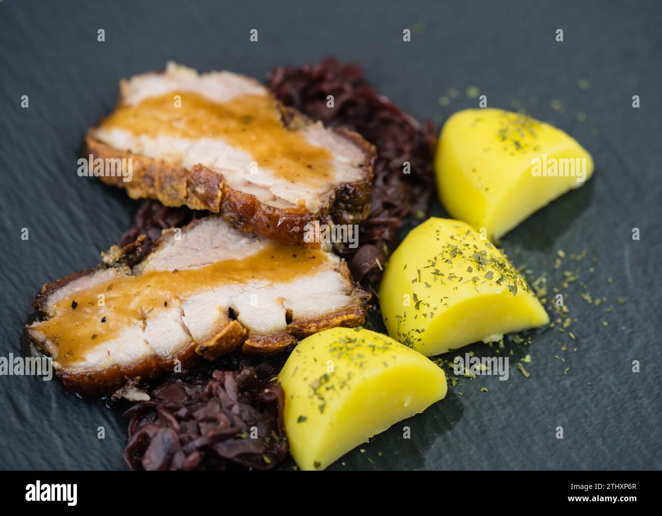 Pork Royal a traditional roast pork with red cabbage and potatoes Stock ...