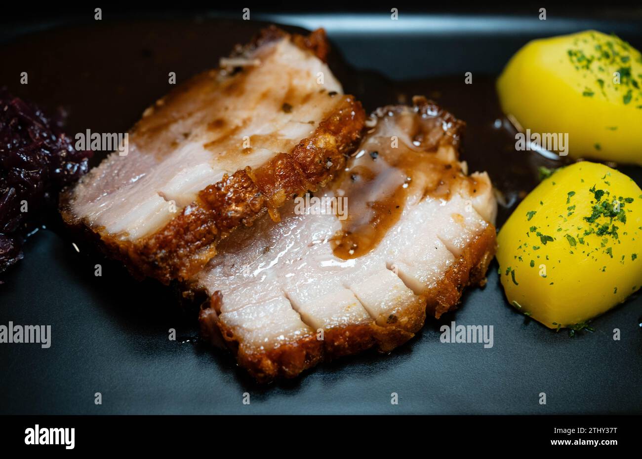 Pork Royal a traditional roast pork with red cabbage and potatoes Stock ...