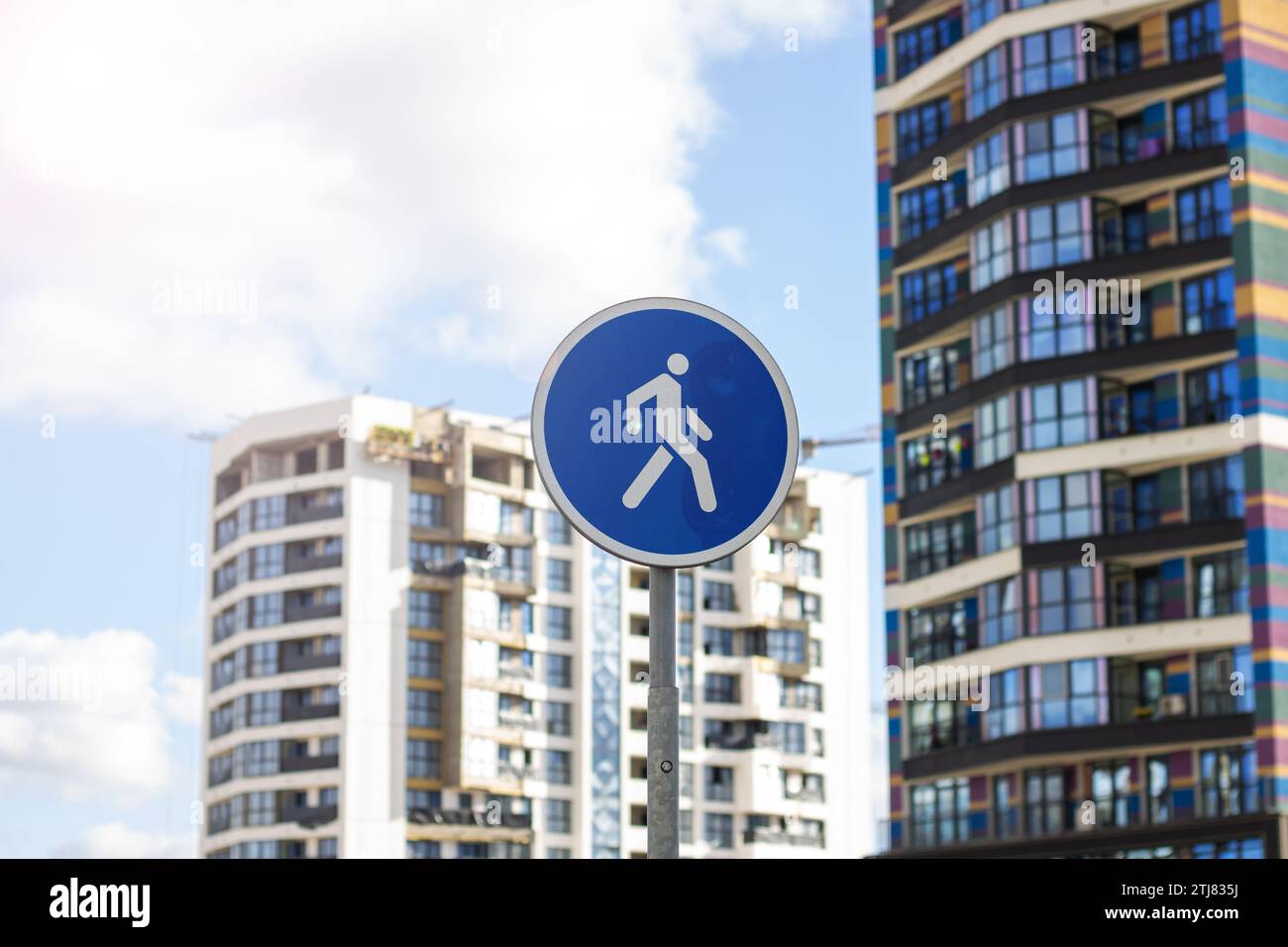 Pedestrian zone road sign on the background of a tall building Stock ...