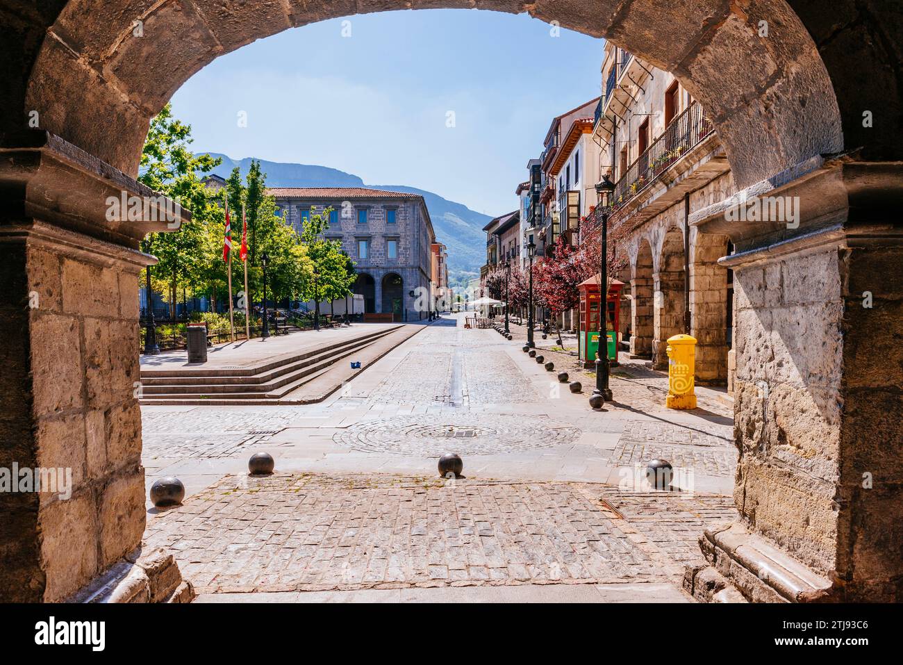 View through the arcades of the Plaza de los Fueros. Orduña, Vizcaya ...