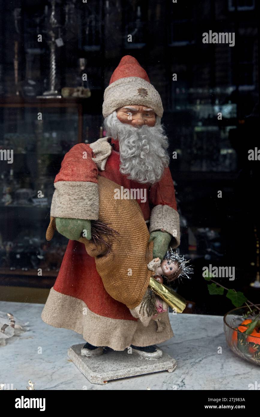 Vintage Santa Claus with a sack of toys in the window of Unicorn Antiques in Dundas Street ...