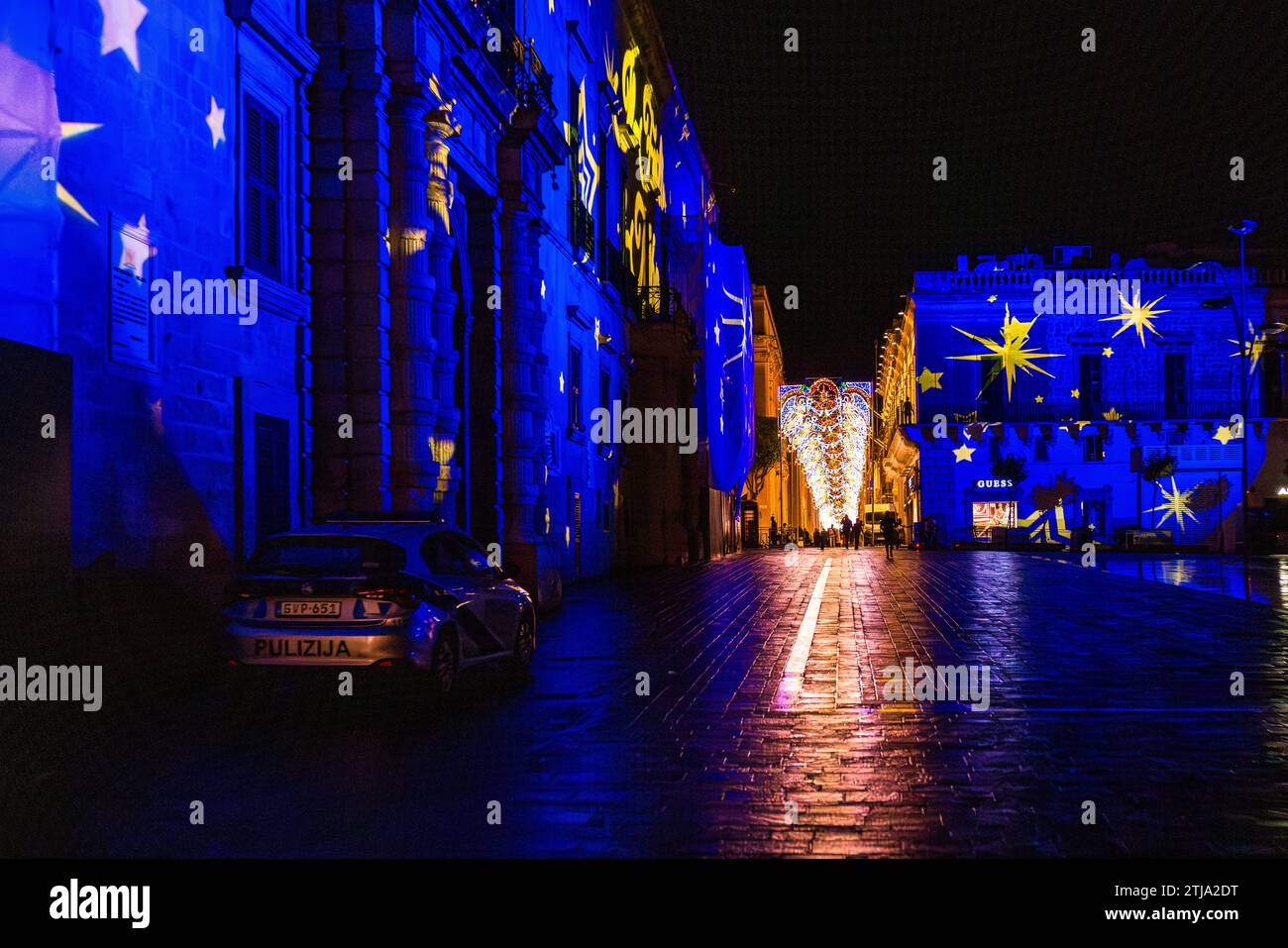 Valletta's old town at Christmas with illuminated house facades and ...