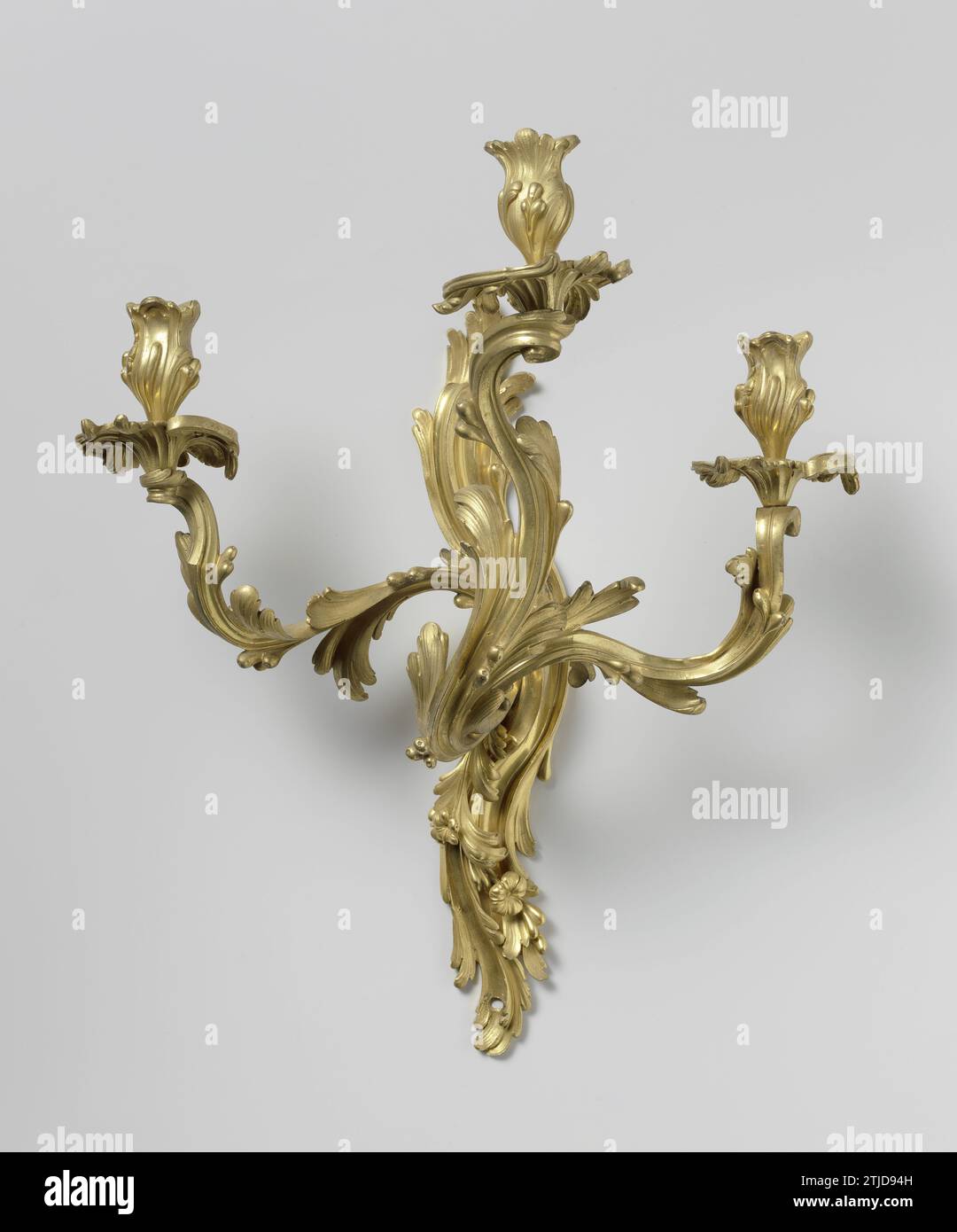 Wall arm of gilded bronze with three arms. Tribes and arms are made up ...