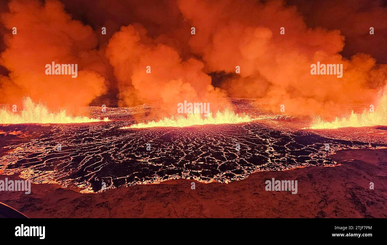 Grindavik, Iceland. 19th Dec, 2023. Lava spews from the erupting ...