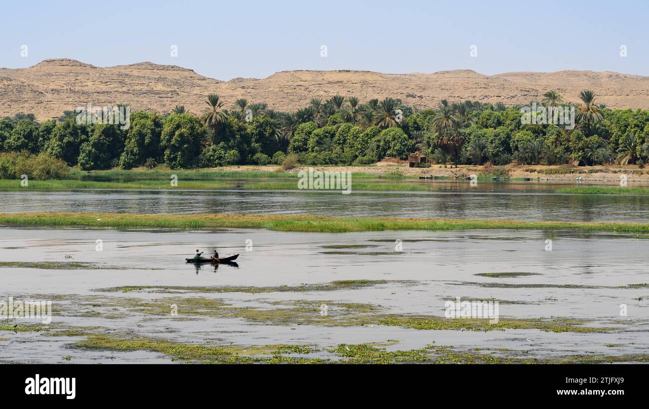 Fishing from a canoe on the Nile. Taftīsh ‘Aţīyah, Aswan, Egypt Stock ...