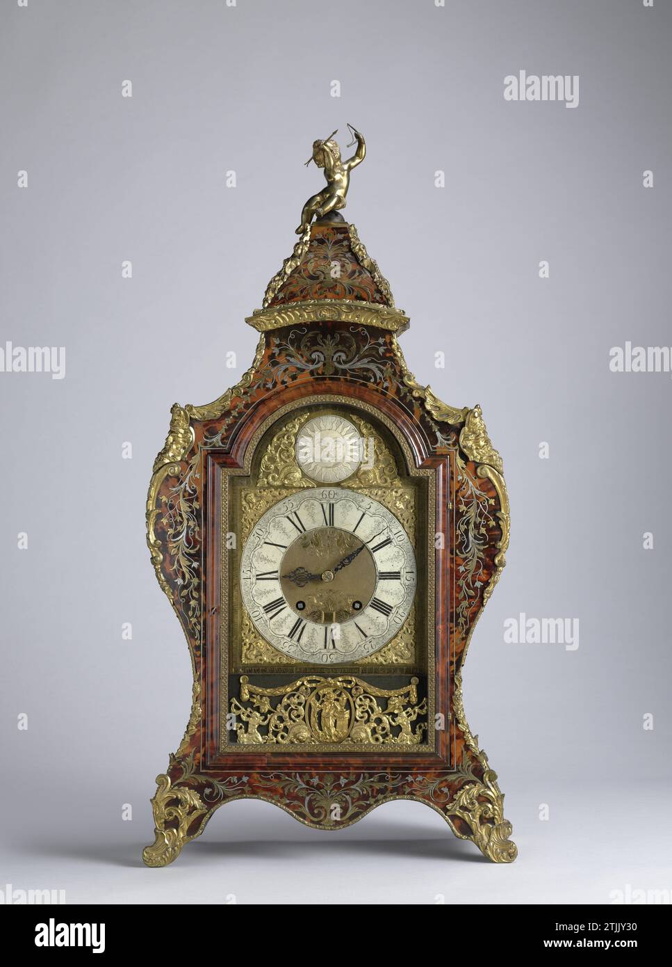Table clock or console clock, veneered with marquetie of copper and tin ...