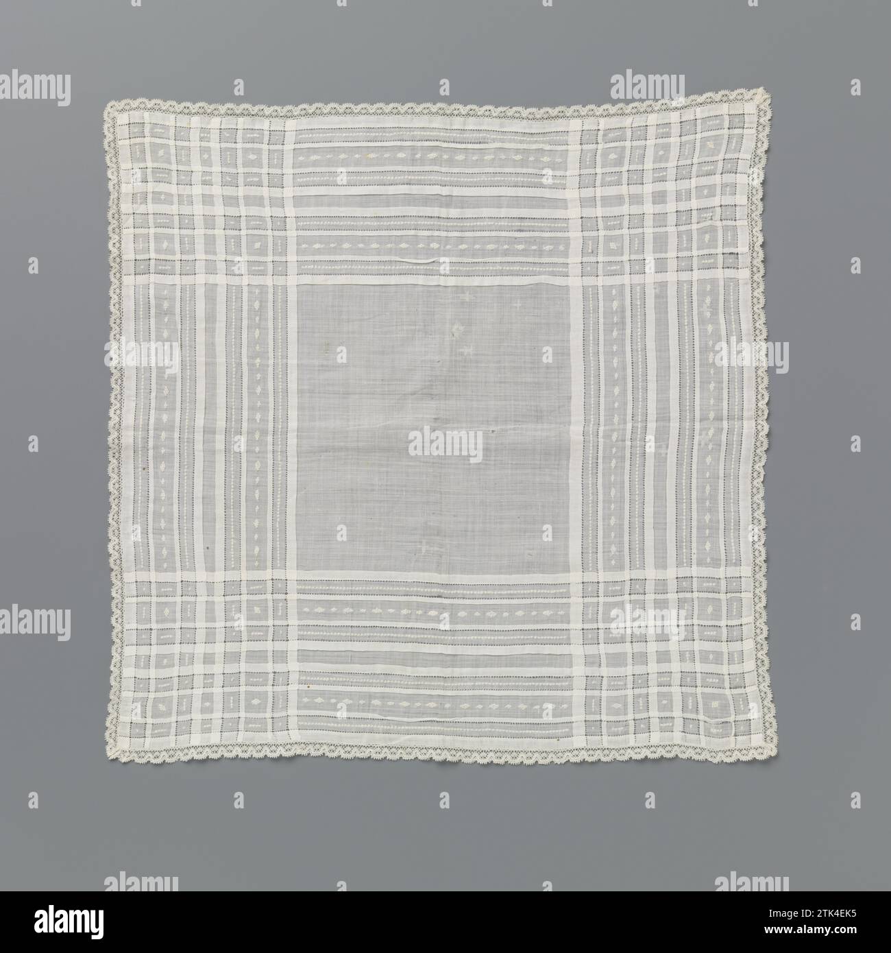 Batist handkerchief with embroidery between checked out and with a ...