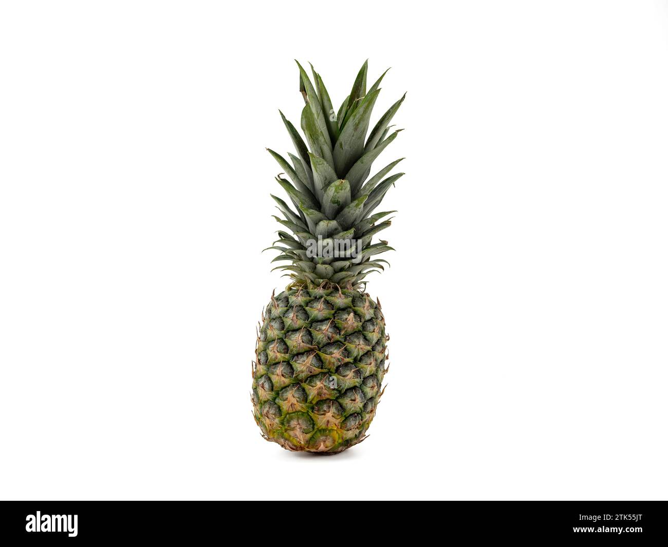 Ripe pineapple on a white background. Pineapple close-up Stock Photo ...