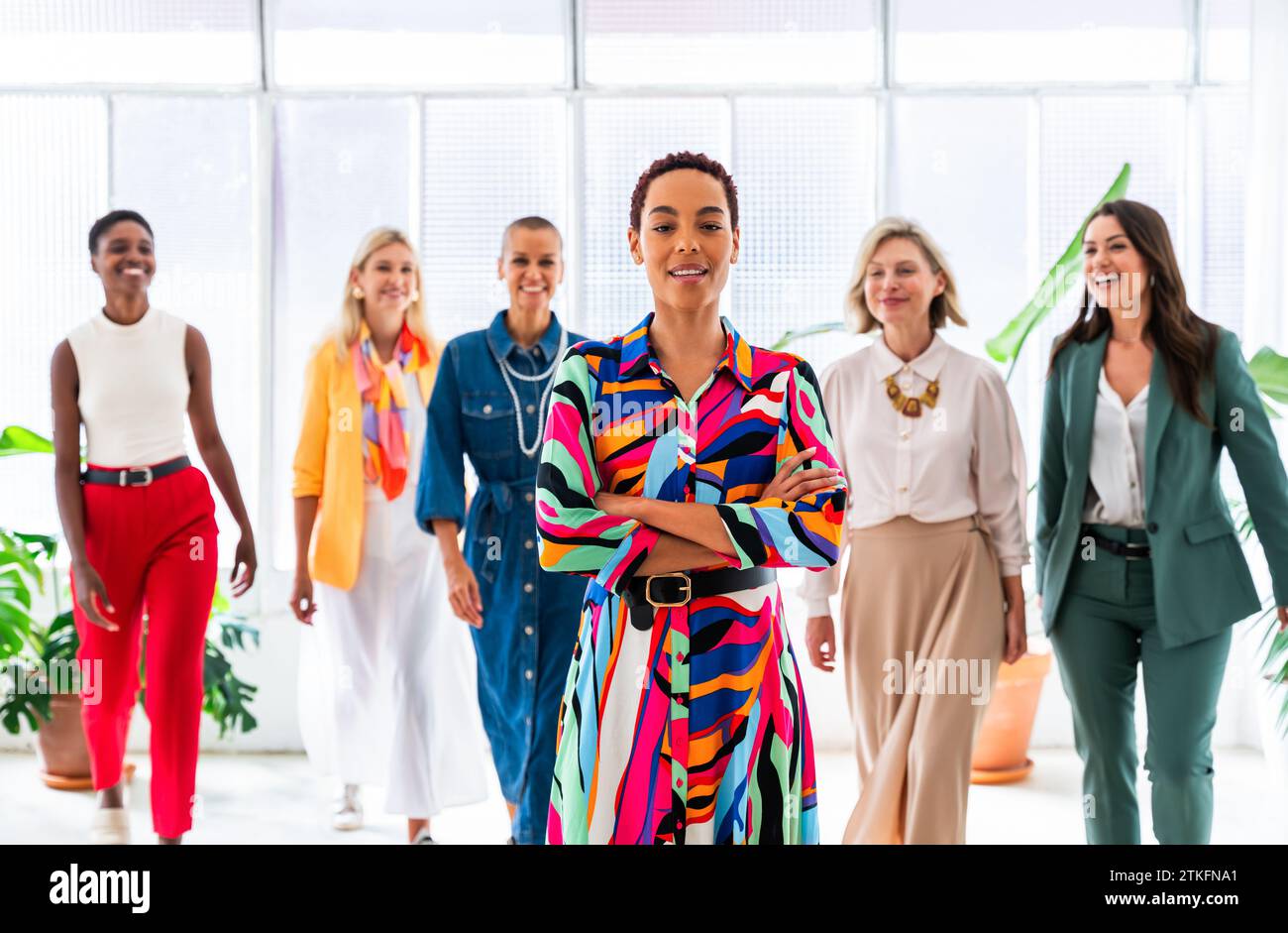 Group of beautiful confident businesswomen meeting in the office ...