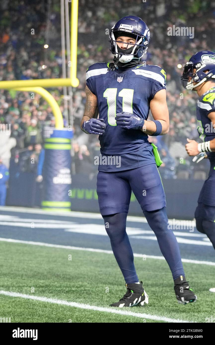 Seattle Seahawks wide receiver Jaxon Smith-Njigba (11) runs out on to ...
