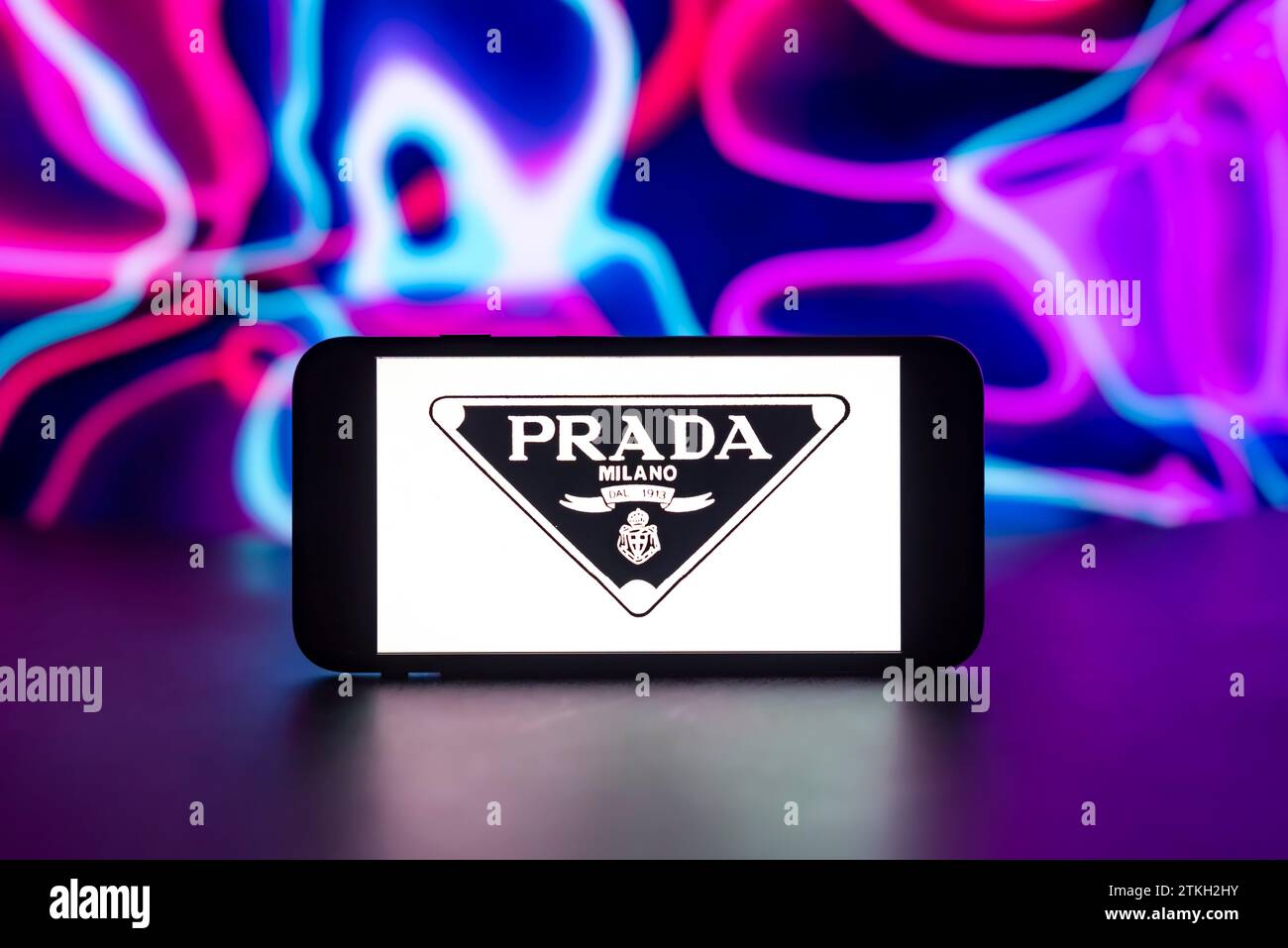 In this photo illustration, the Prada logo is seen displayed on a ...