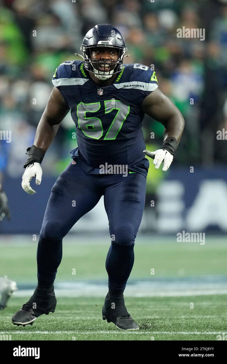 Seattle Seahawks offensive tackle Charles Cross (67) looks on during an ...