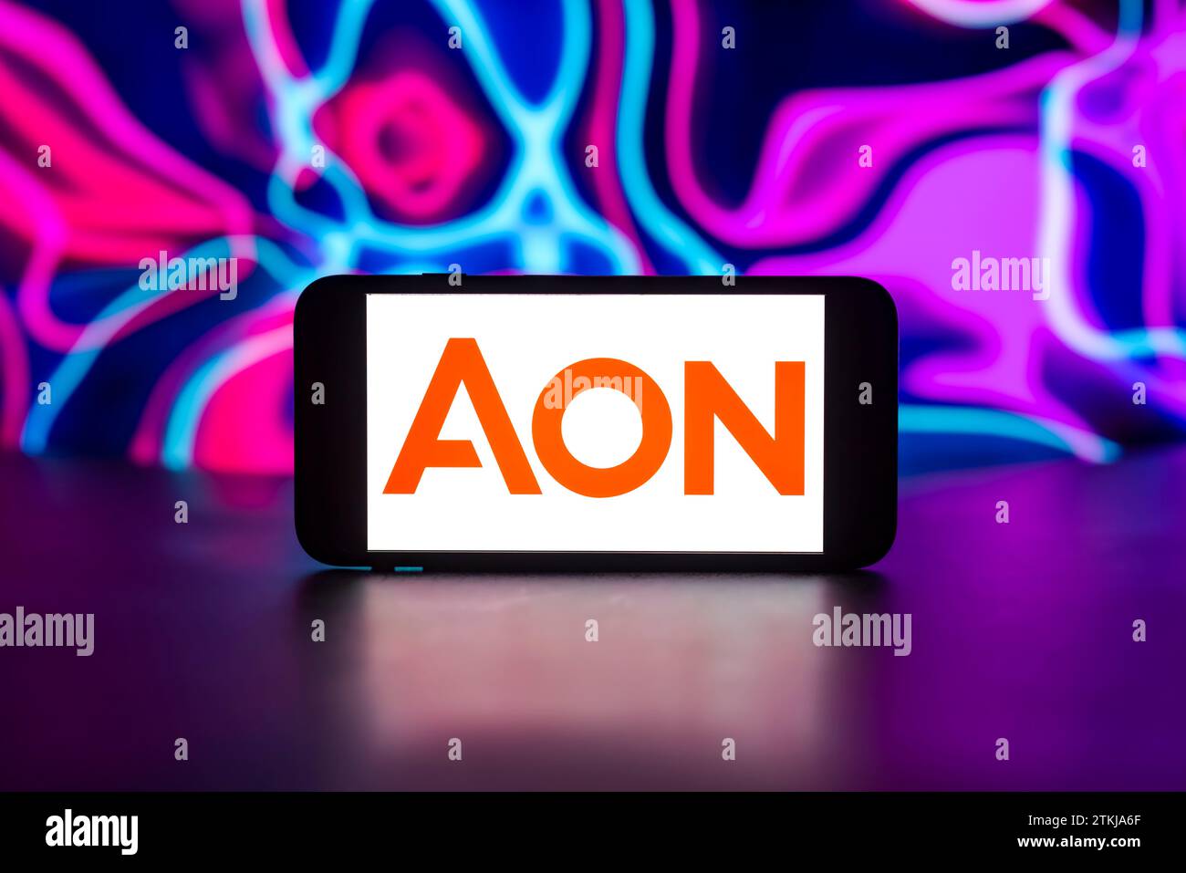 India. 20th Dec, 2023. In this photo illustration, the AON logo is seen ...