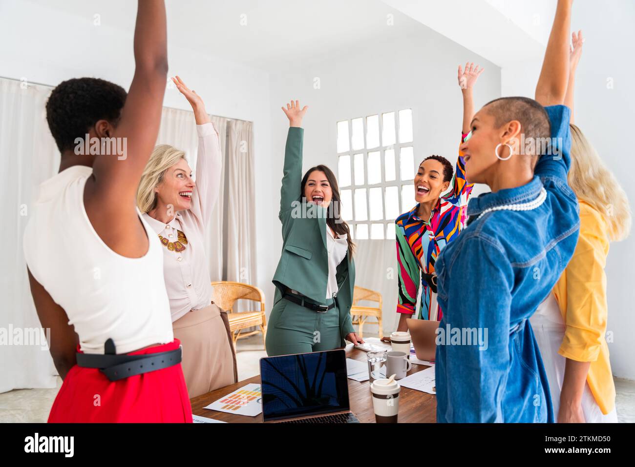 Group of beautiful confident businesswomen meeting in the office ...
