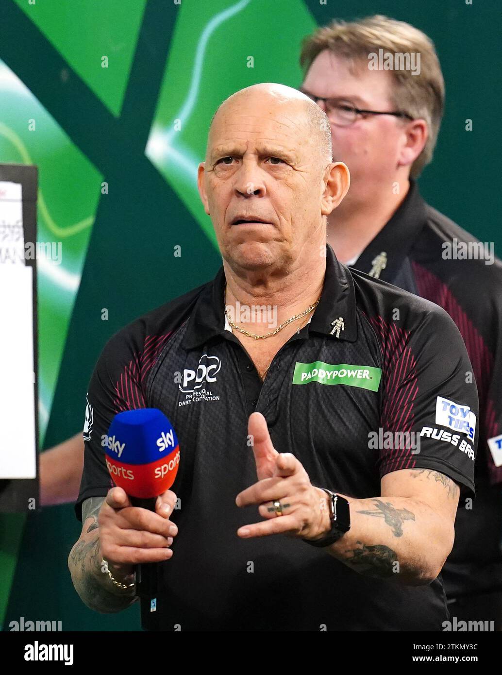 Referee Russ Bray is seen on day six of the Paddy Power World Darts ...