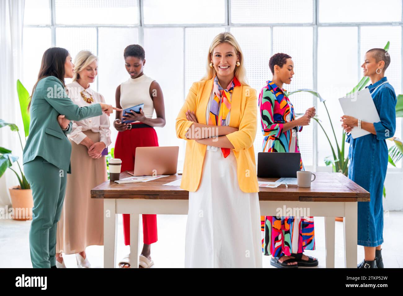 Group of beautiful confident businesswomen meeting in the office ...