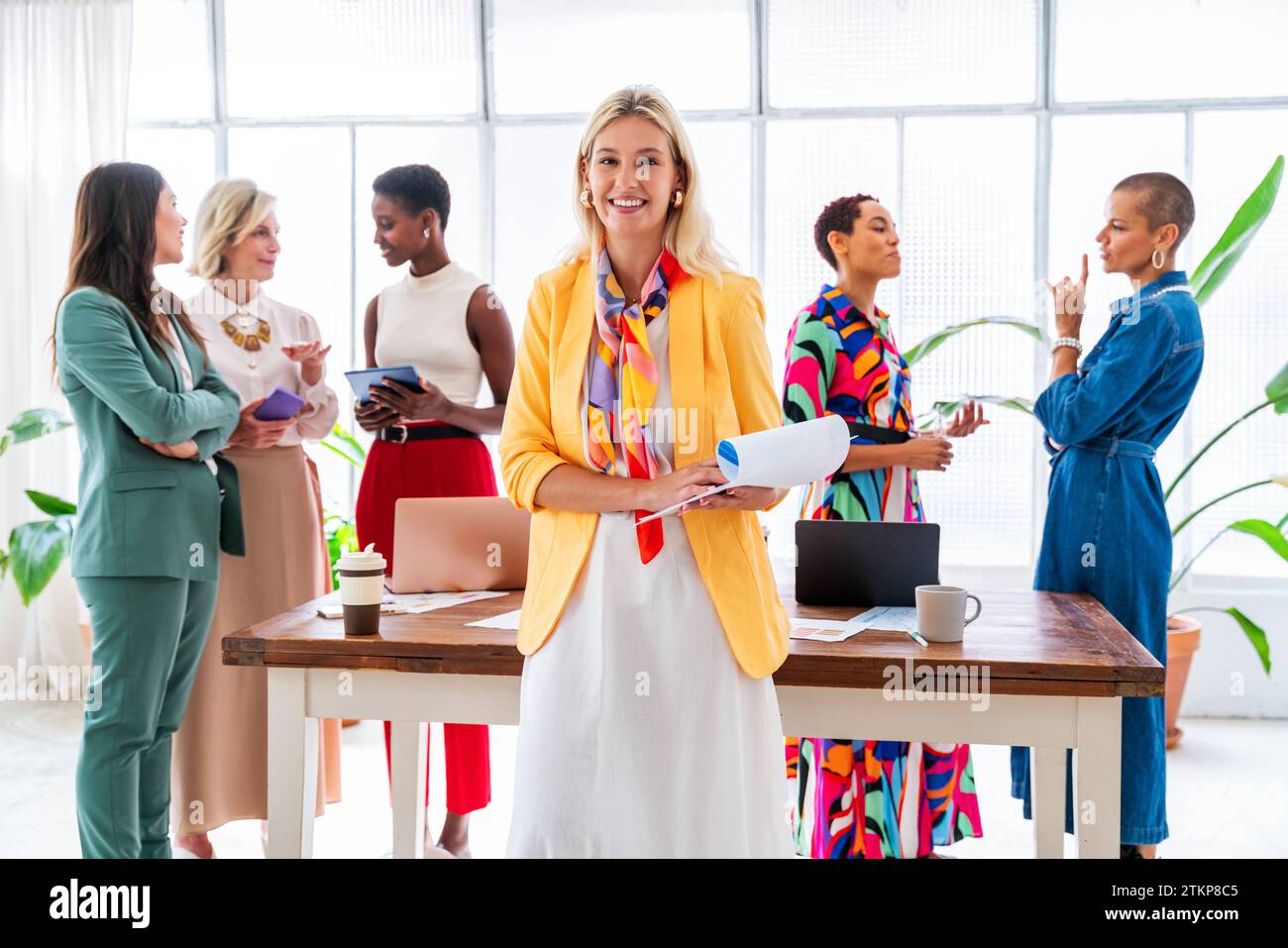 Group of beautiful confident businesswomen meeting in the office ...