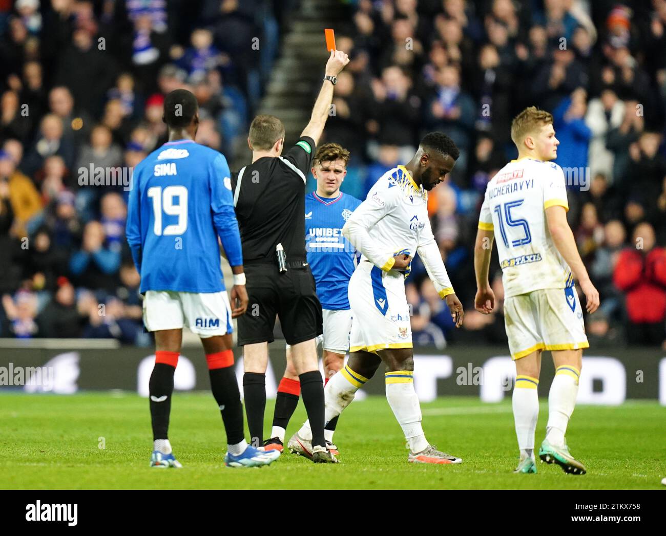 St Johnstone's Diallang Jaiyesimi is shown a red card and is sent off ...