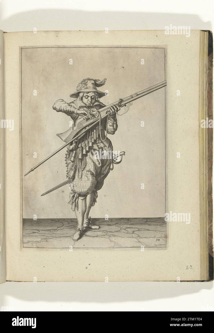 Soldier who blows his wick clean, covering the pan of his musket with ...