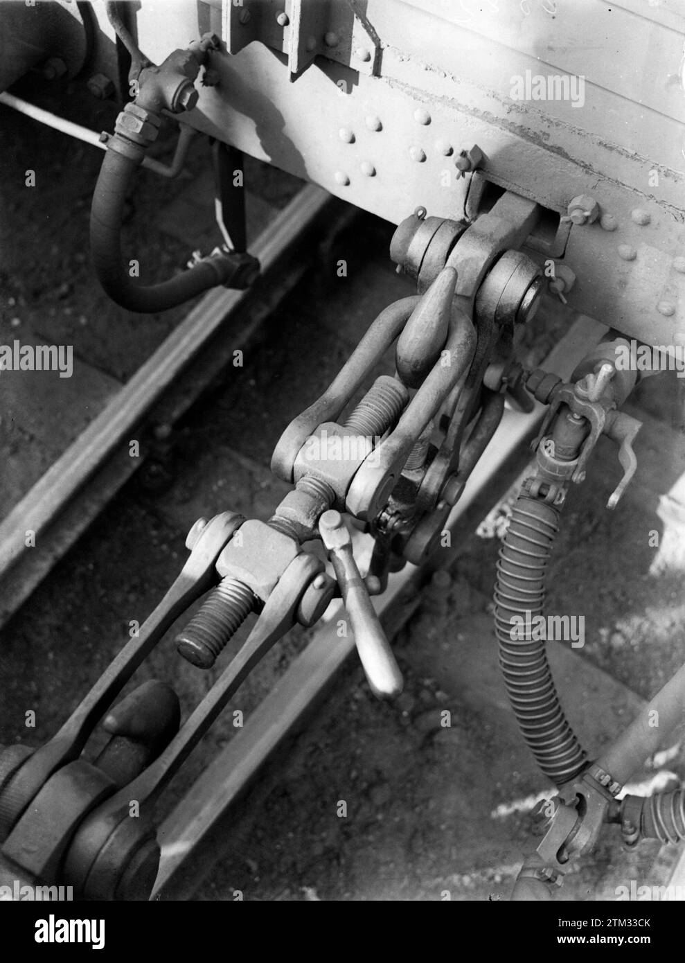Coupling between a locomotive and a wagon ca. 1932 Stock Photo - Alamy