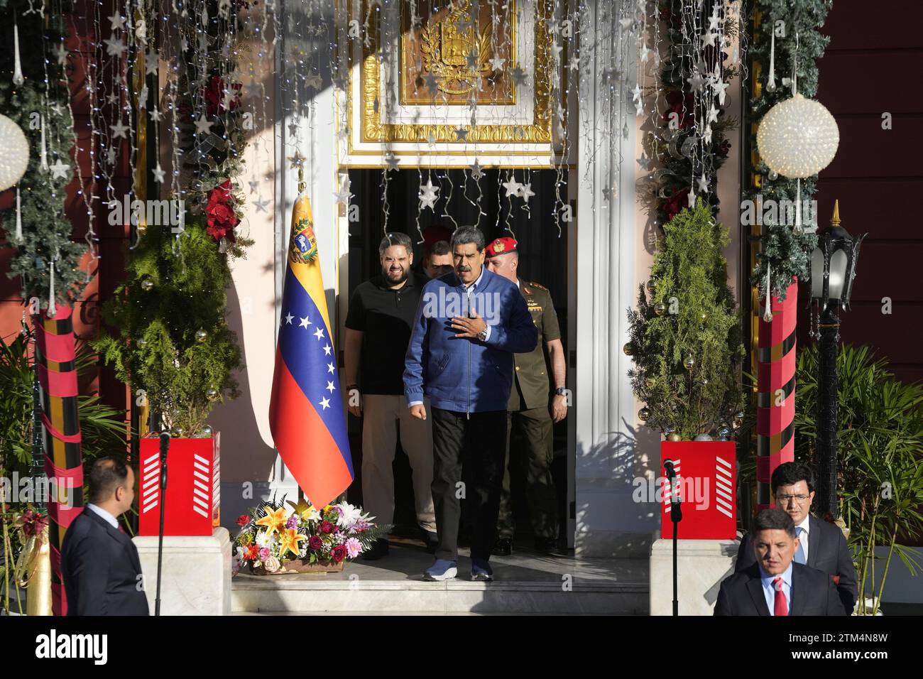 Venezuelan President Maduro exits a door at Miraflores presidential ...