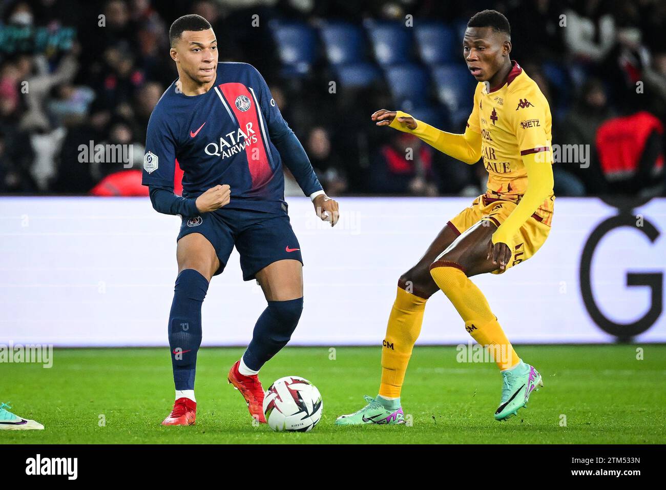 Kylian MBAPPE of PSG and Danley JEAN JACQUES of Metz during the French ...