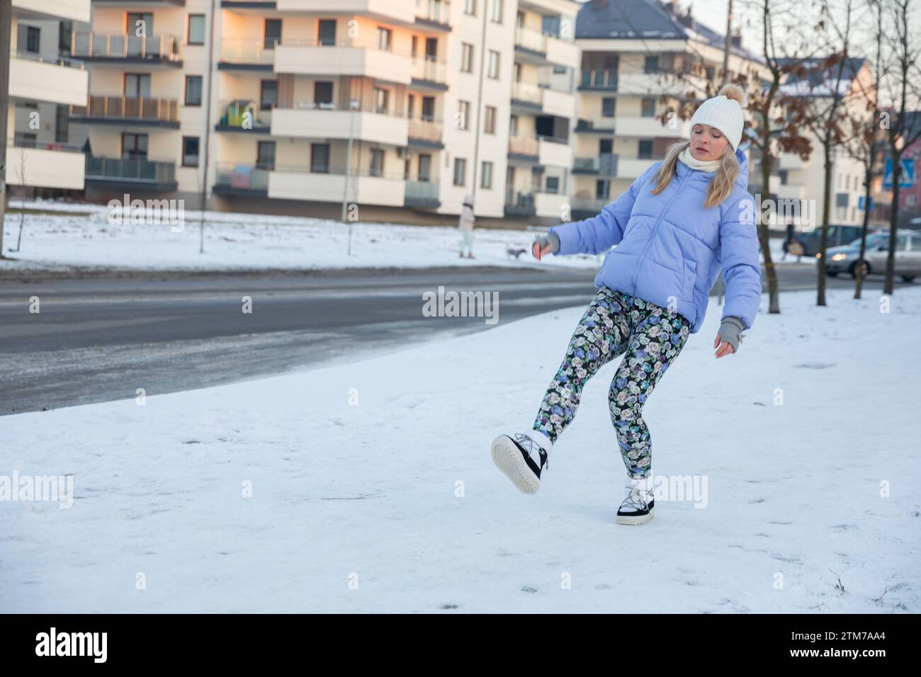 The woman loses her balance while walking and wobbles on her feet Stock ...